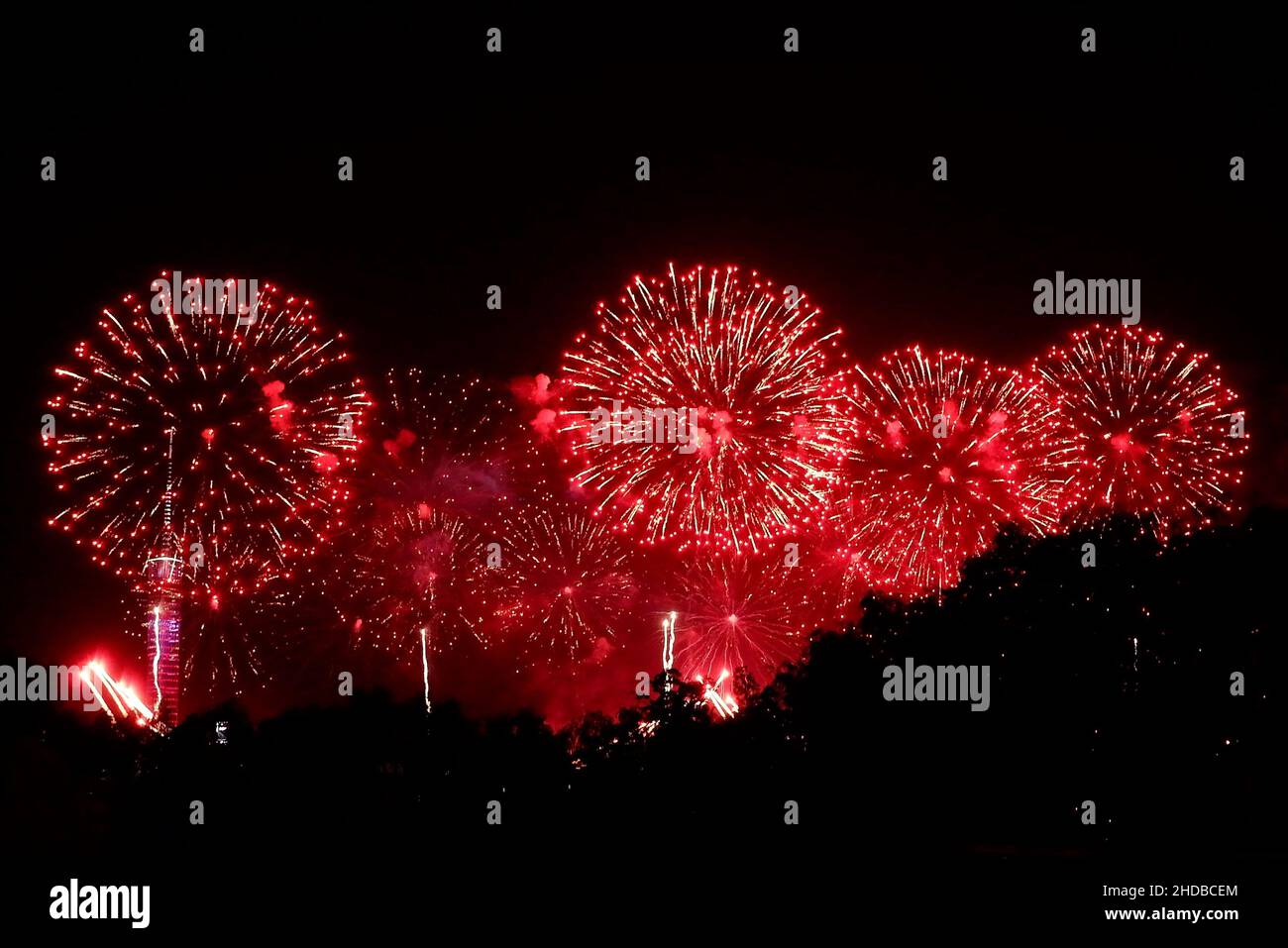 Beautiful shot of exploding red fireworks in a dark sky Stock Photo - Alamy