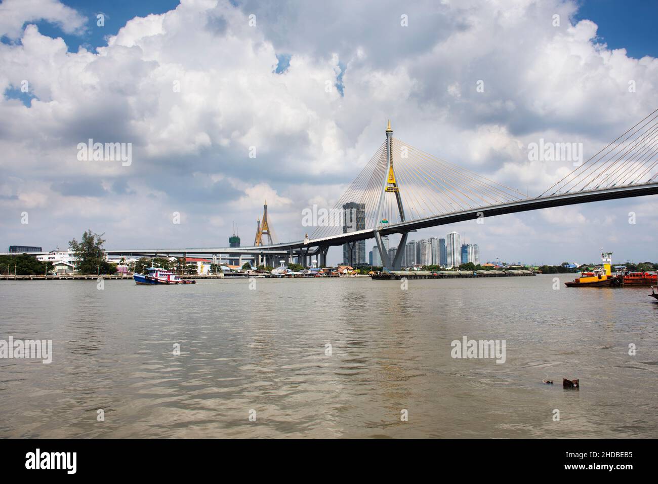 View landscape cityscape with barge and tugboat cargo ship delivery ...