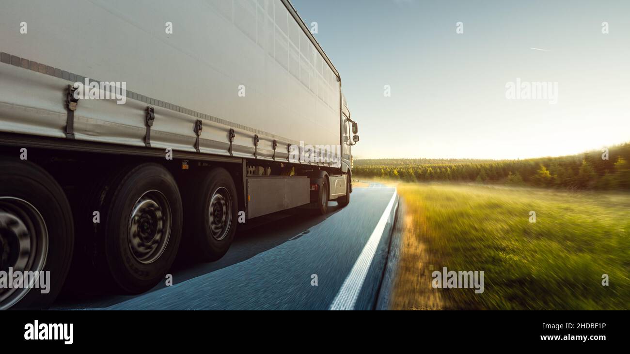 Truck - delivery van on a road Stock Photo - Alamy