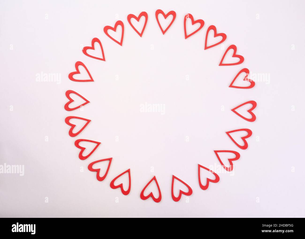 Red heart figures make a circle Stock Photo - Alamy