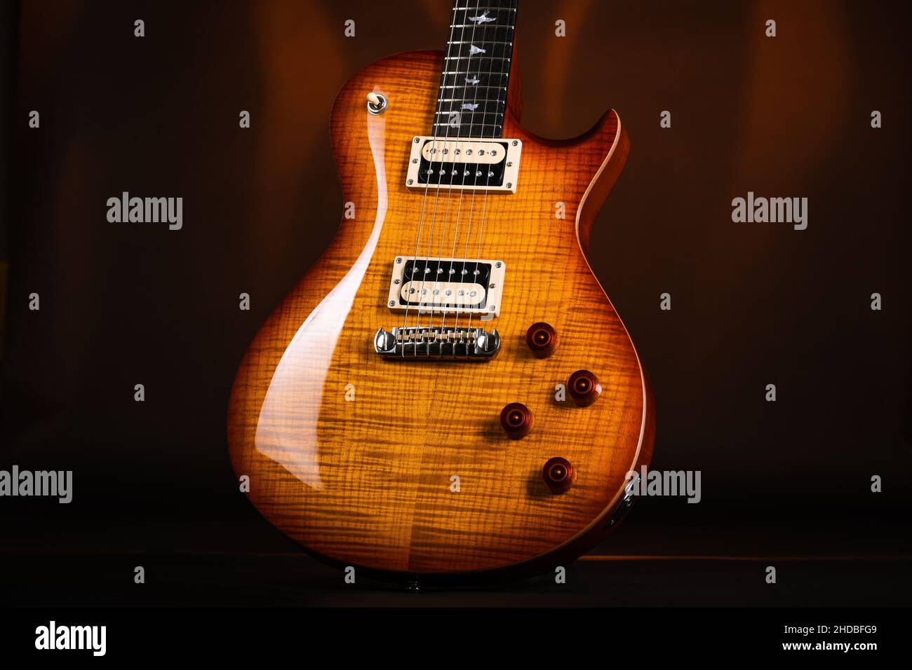 Sunburst guitar on black Stock Photo - Alamy