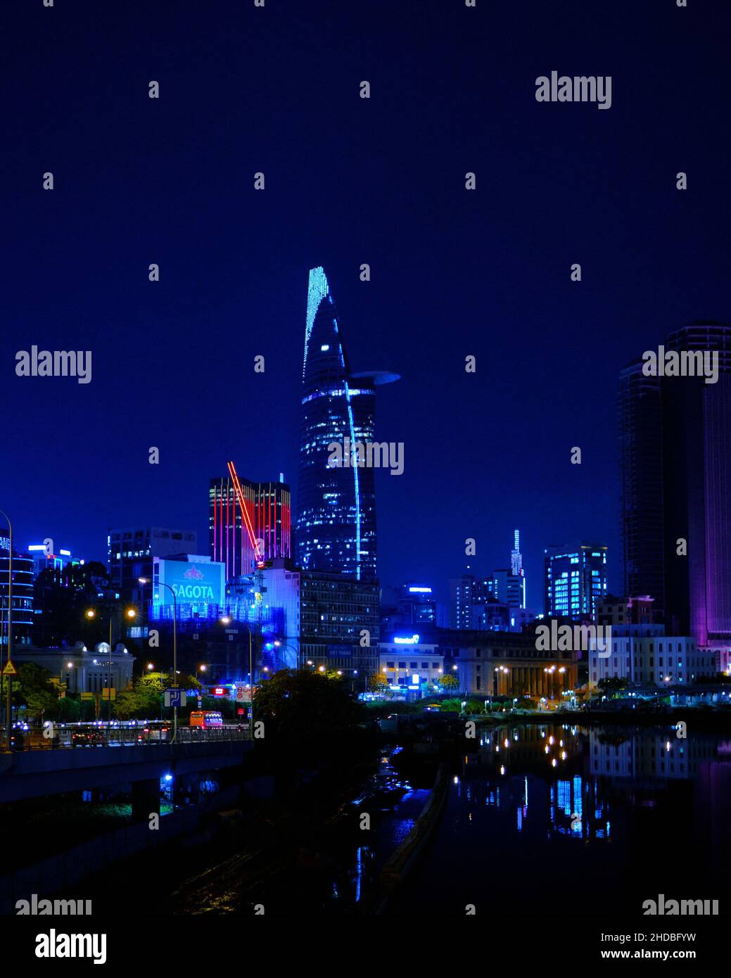 Bitexco Financial Tower glows in blue hues on Saigon’s skyline from ...