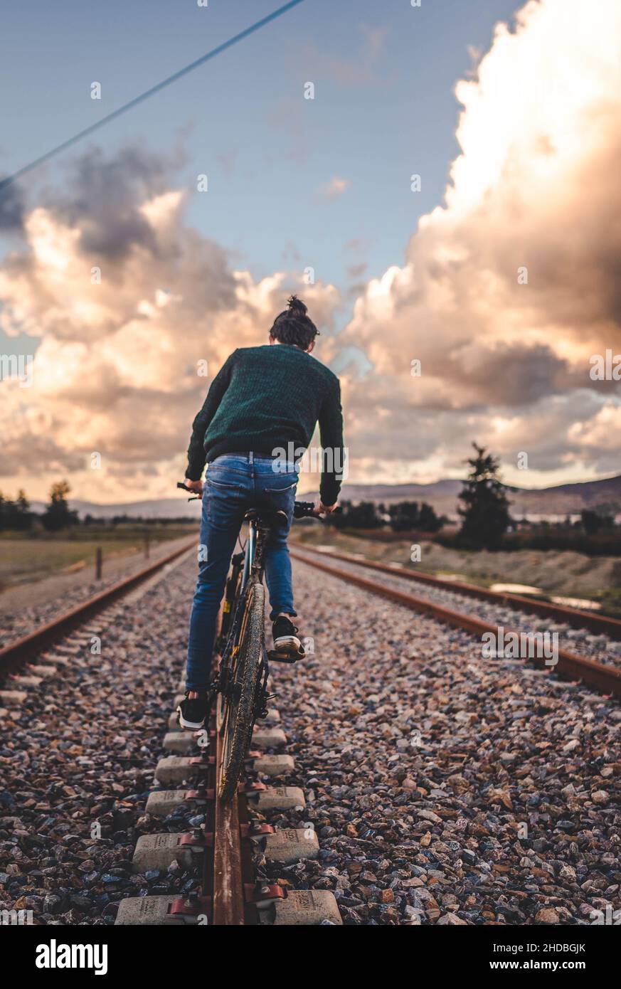Man cycling from behind hi-res stock photography and images - Alamy