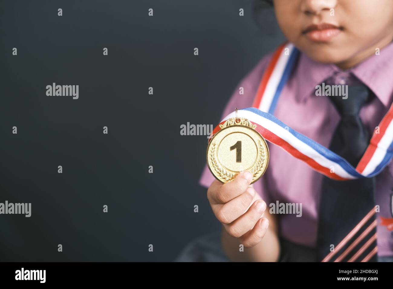 Girl trophy medal hi-res stock photography and images - Alamy