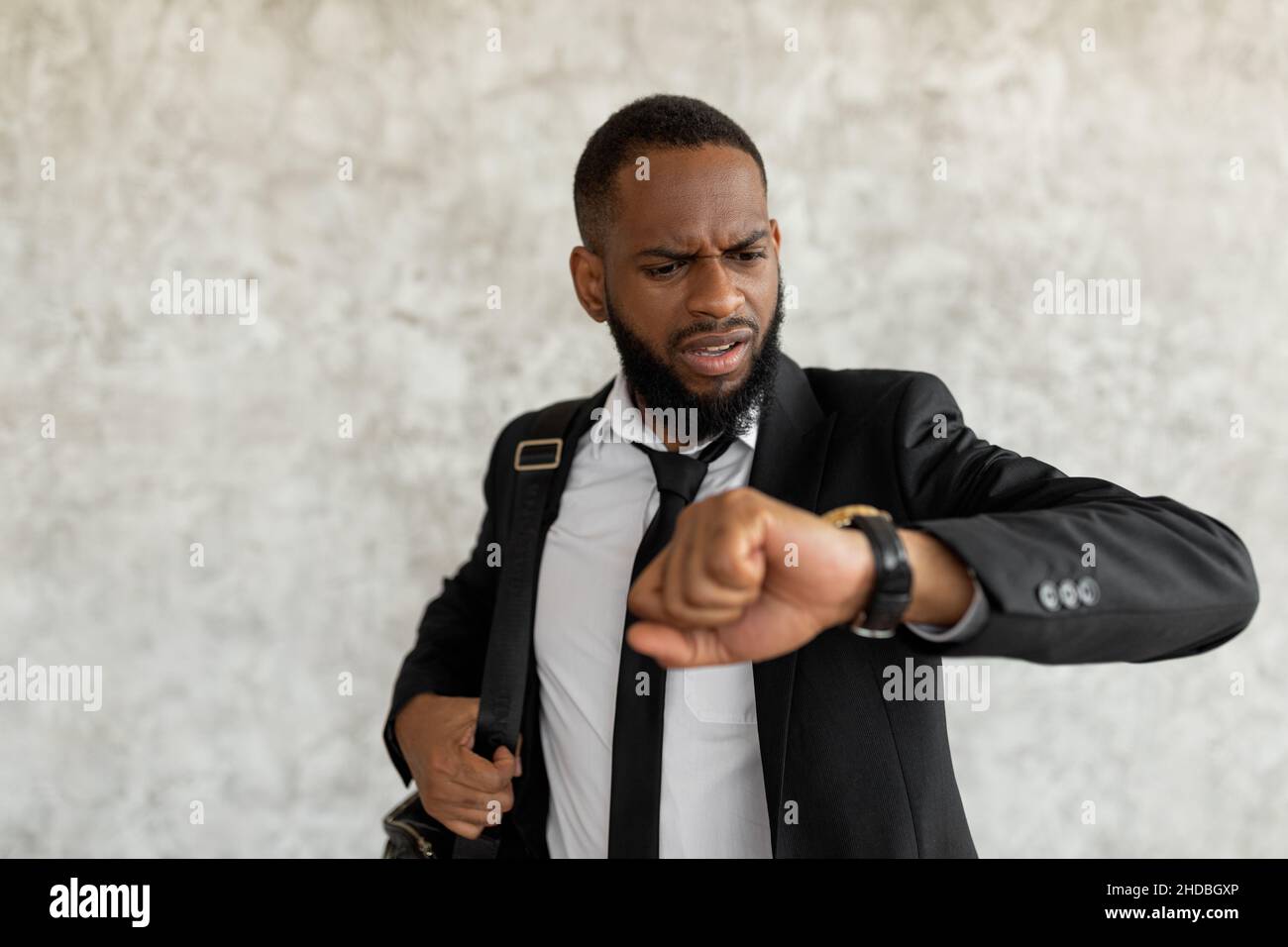 Man late for work, suit hi-res stock photography and images - Alamy