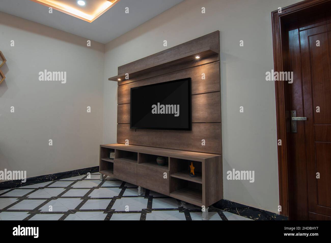 LED TV on the multimedia wall in living room interior design idea Stock ...