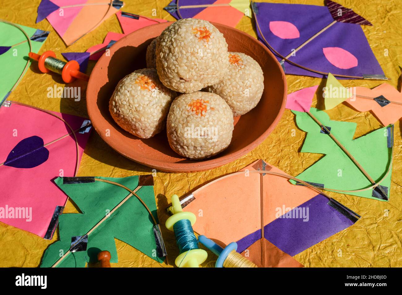 Tilgul ladoo recipe. white sesame seeds coated with jaggery sugar ...
