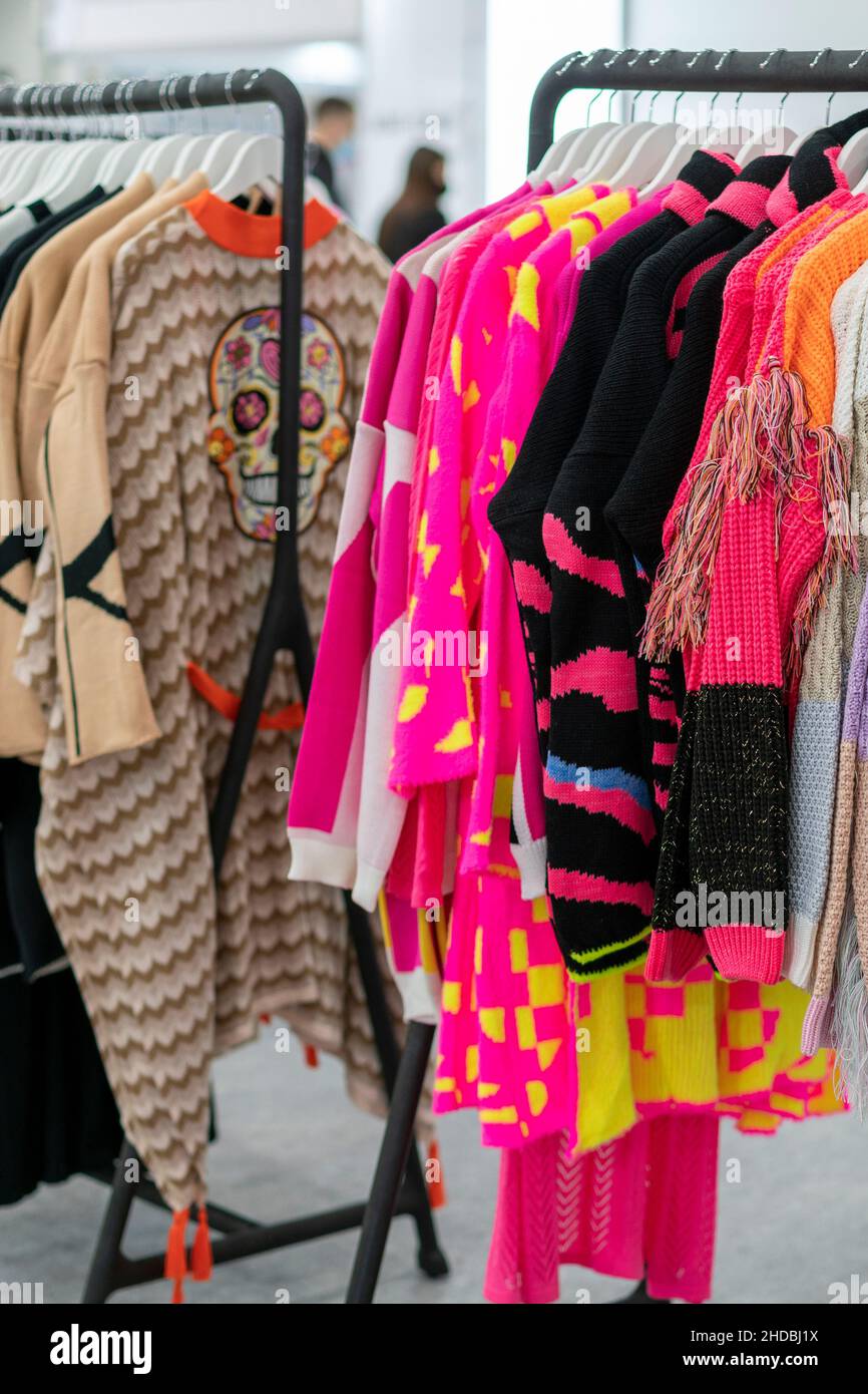 spring and summer women's clothing in the store. bright, modern clothes ...