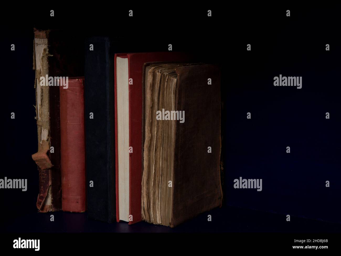 Collection of vintage books on black banner template Stock Photo - Alamy