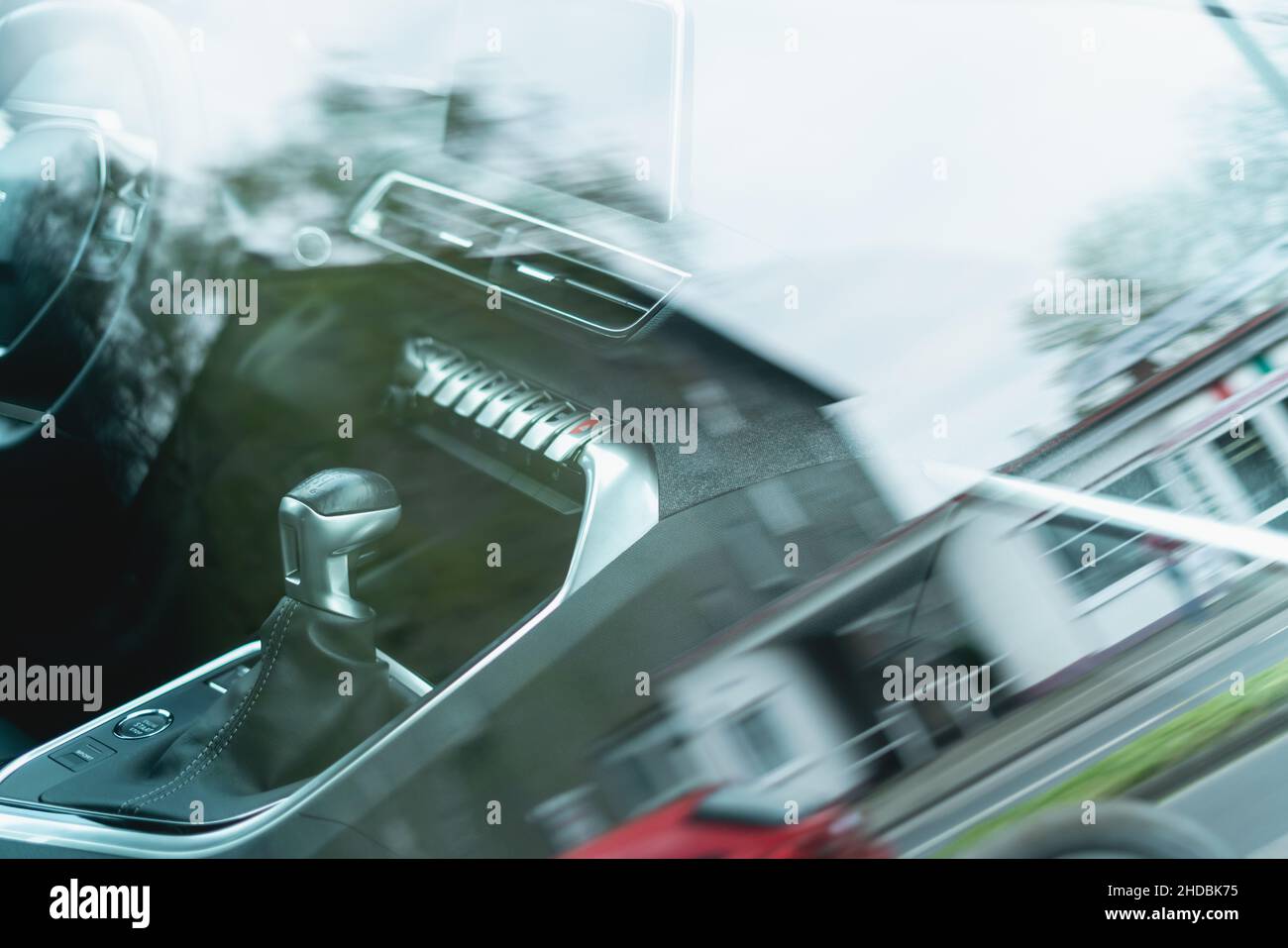 Cockpit of a modern luxury comfortable car seen through the window ...