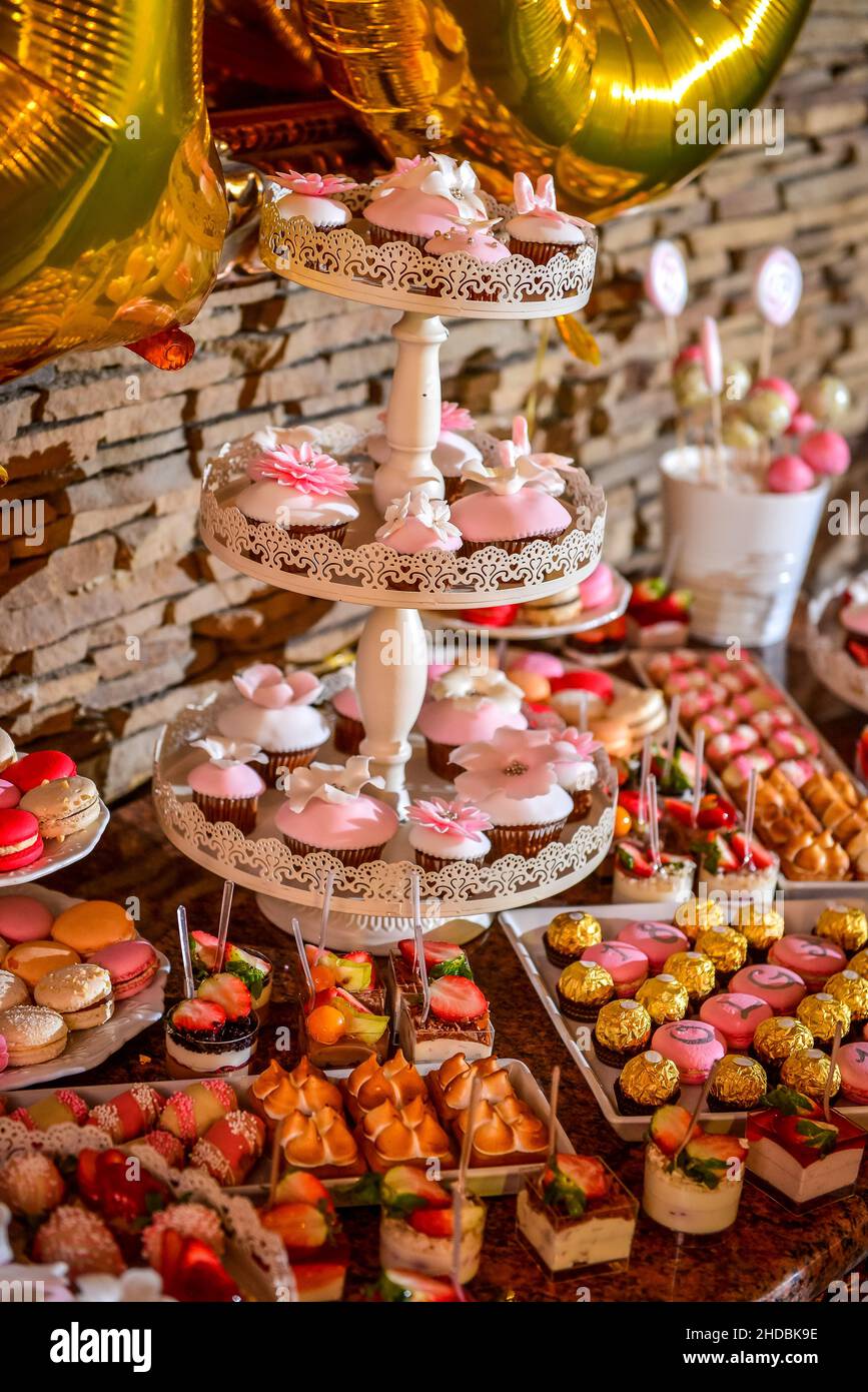Vertical shot of dessert table in a debut celebration Stock Photo - Alamy