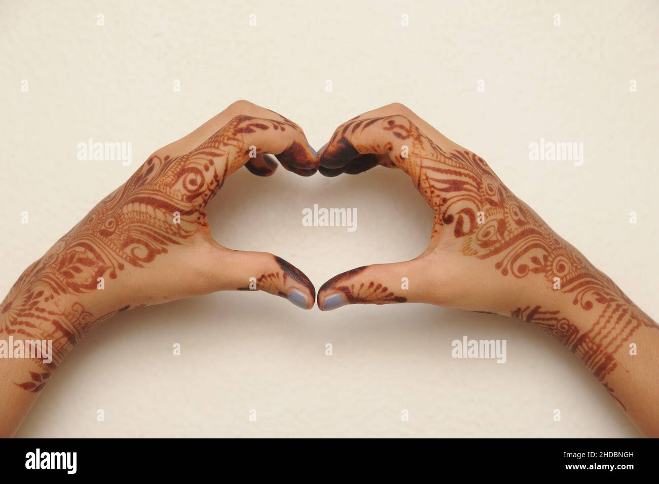 Indian hands making heart shape hi-res stock photography and images - Alamy