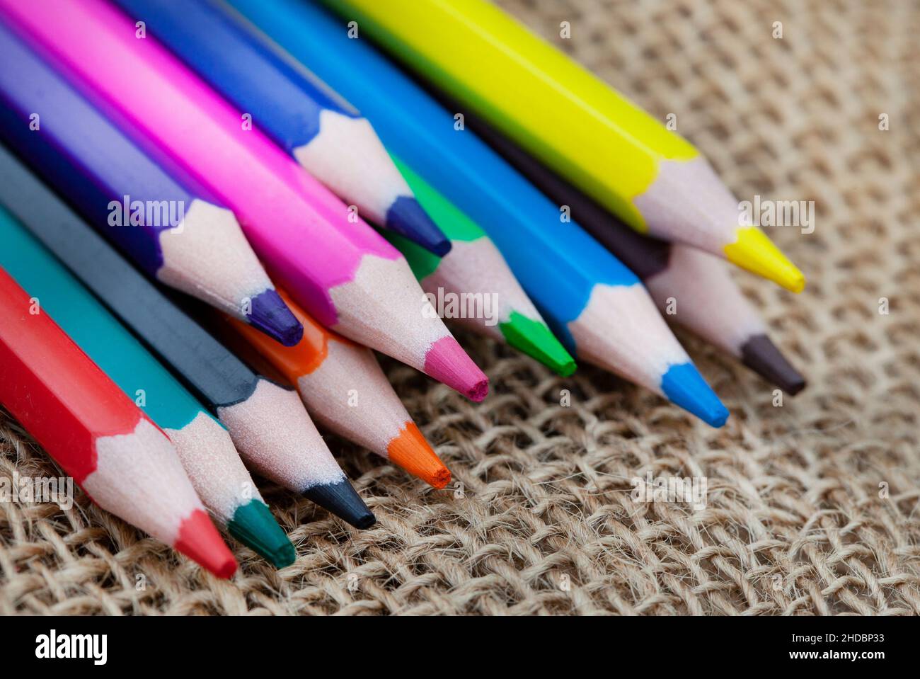 Colored pencils on neutral background with copy space Stock Photo - Alamy