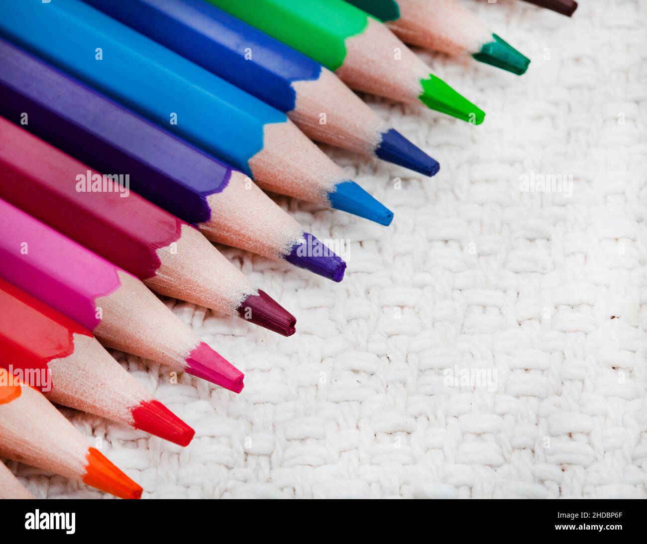 Colored pencils on neutral background with copy space Stock Photo - Alamy