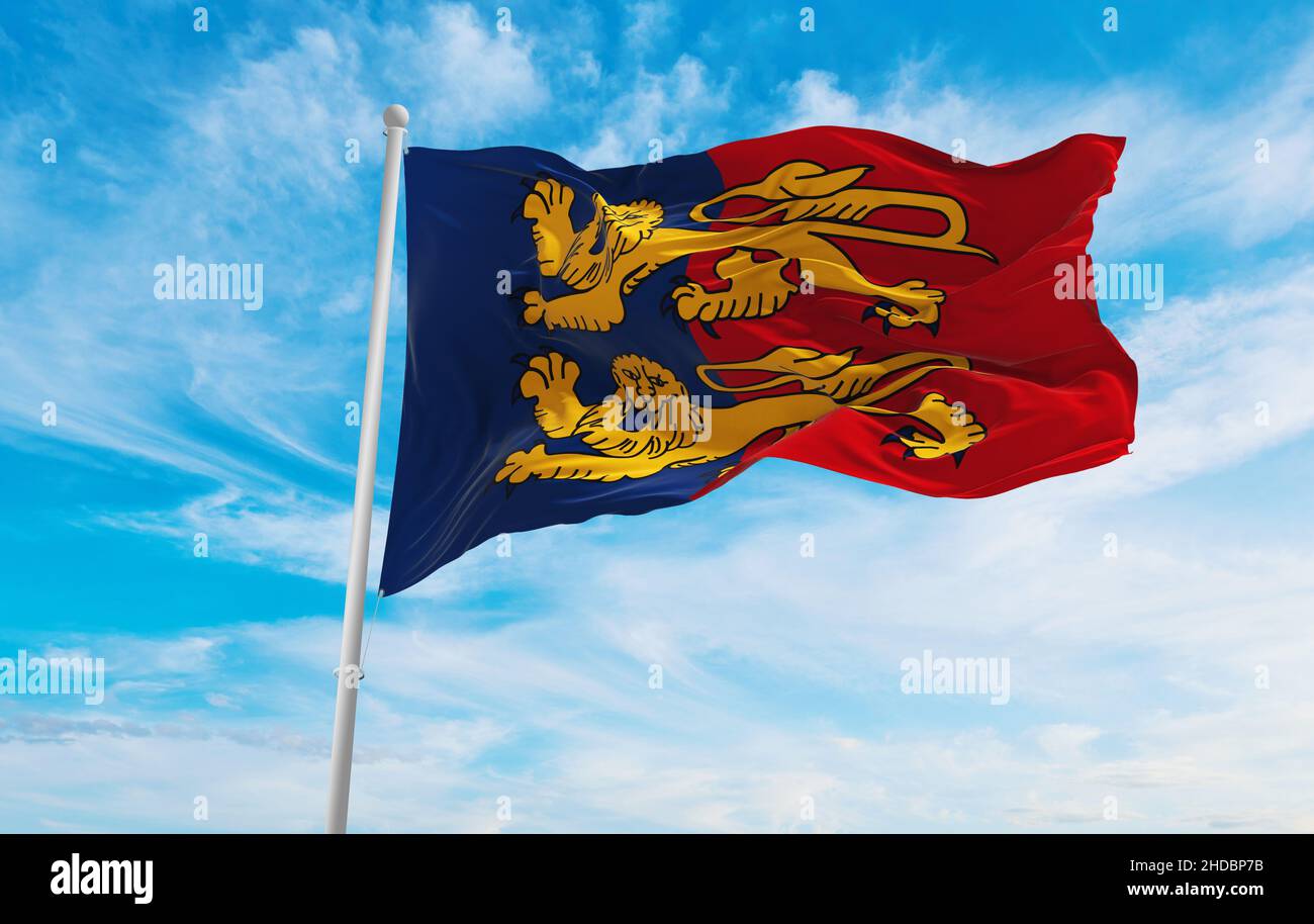 flag of department of Manche, France at cloudy sky background on sunset ...