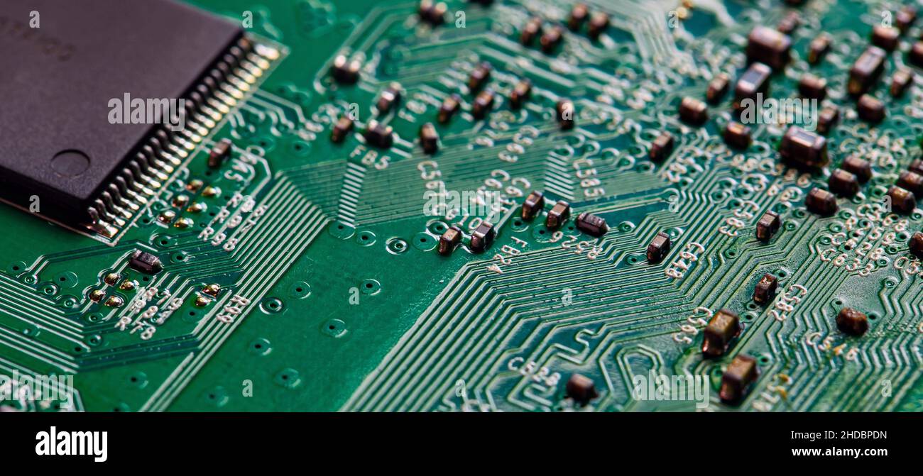 Macro Close up of printed wiring on PC circuit board of modem router ...