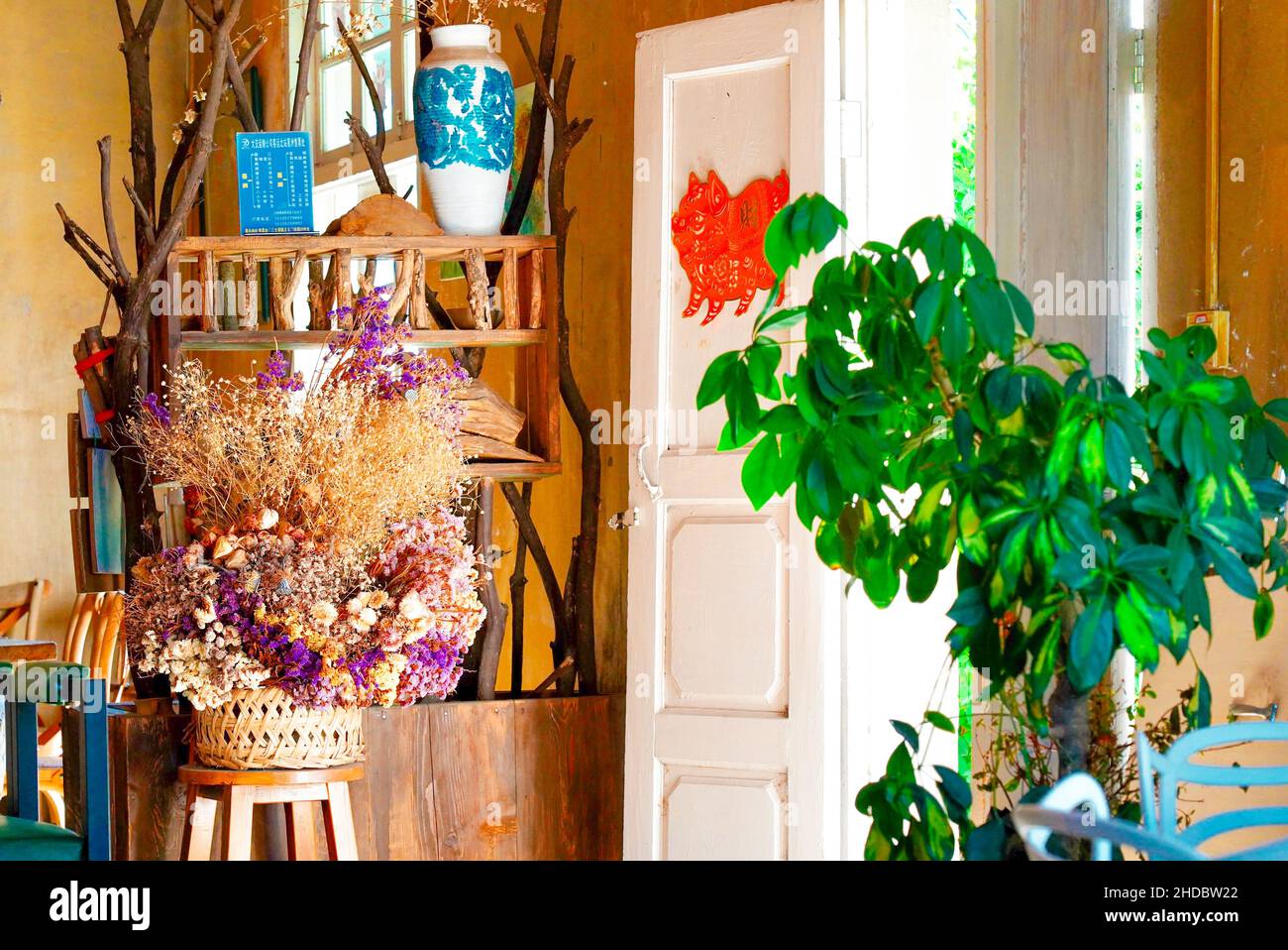 Interior view of an old house with wooden decorations and plants Stock ...