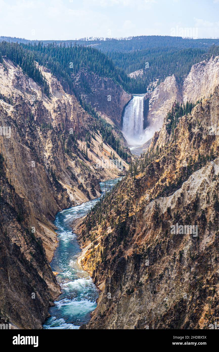 Vertical shot of the river flowing between rocks. Yellowstone National ...