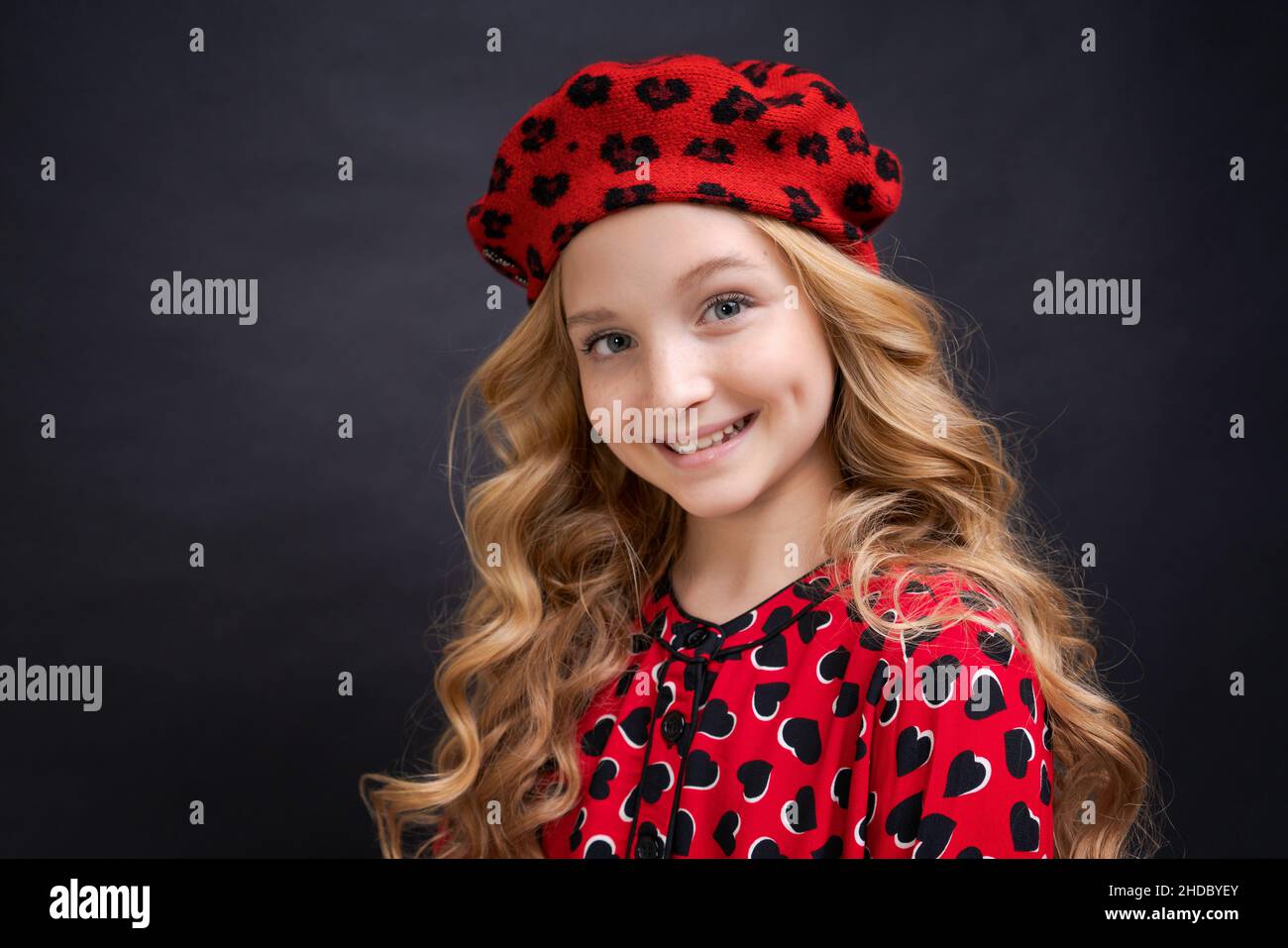 French fashion icon. Happy child wearing french red beret and dress on ...