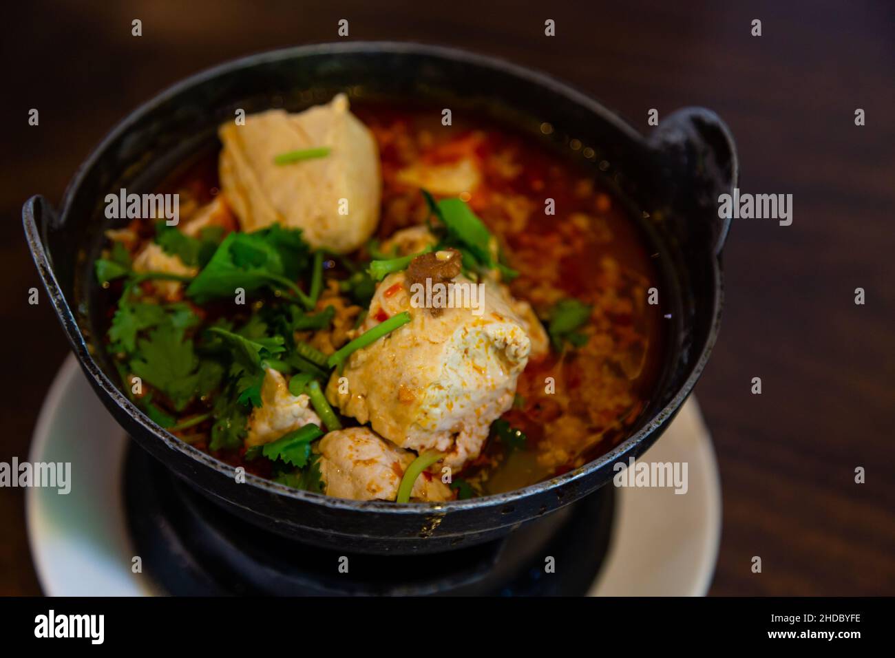 Steamed hot stinky tofu in chili Stock Photo - Alamy