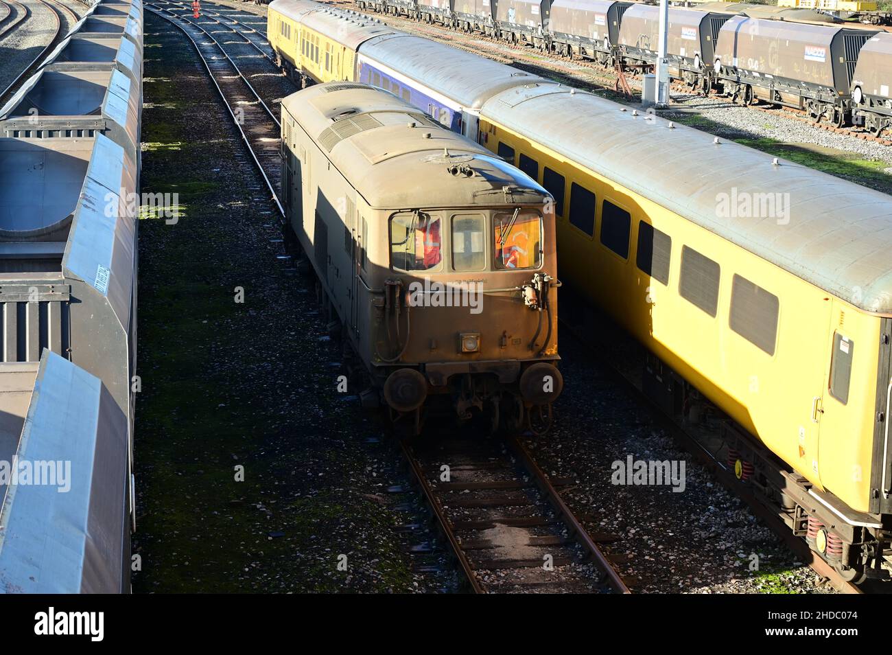 A dirty class 73 locomotive moving around Tonbridge West Yard on a cold ...