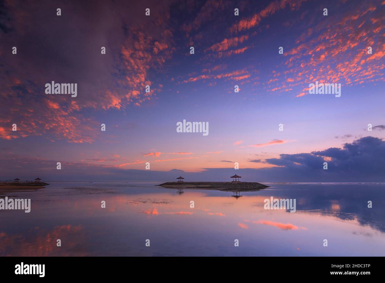 Beach with temple in the water, reflection and long exposure at sunrise ...