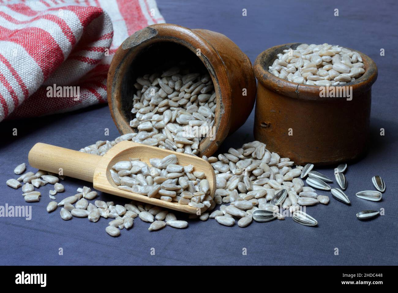 Peeled sunflower seeds in pots and scoops Stock Photo - Alamy
