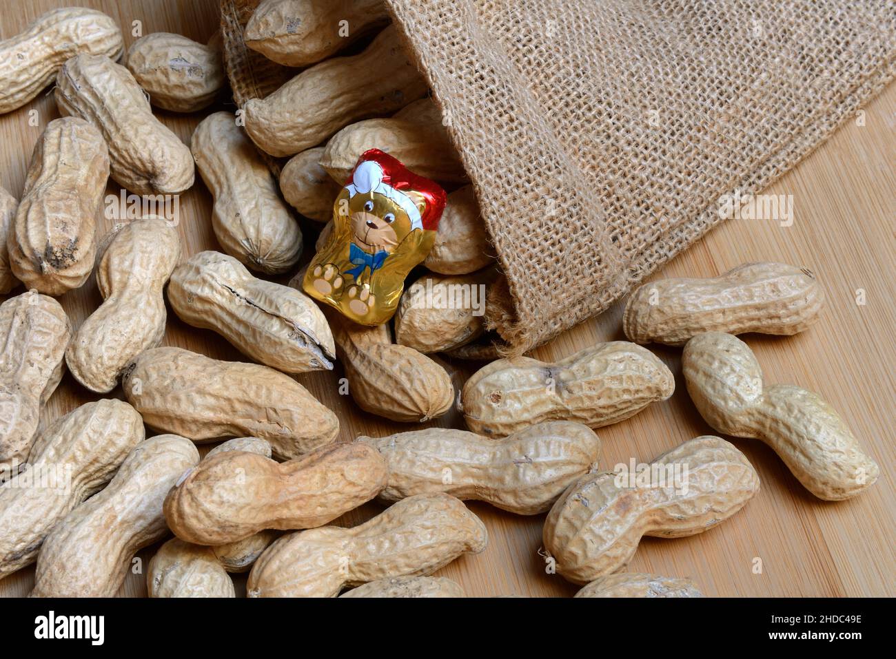 Peanuts and chocolate figure in sack, Advent Stock Photo - Alamy