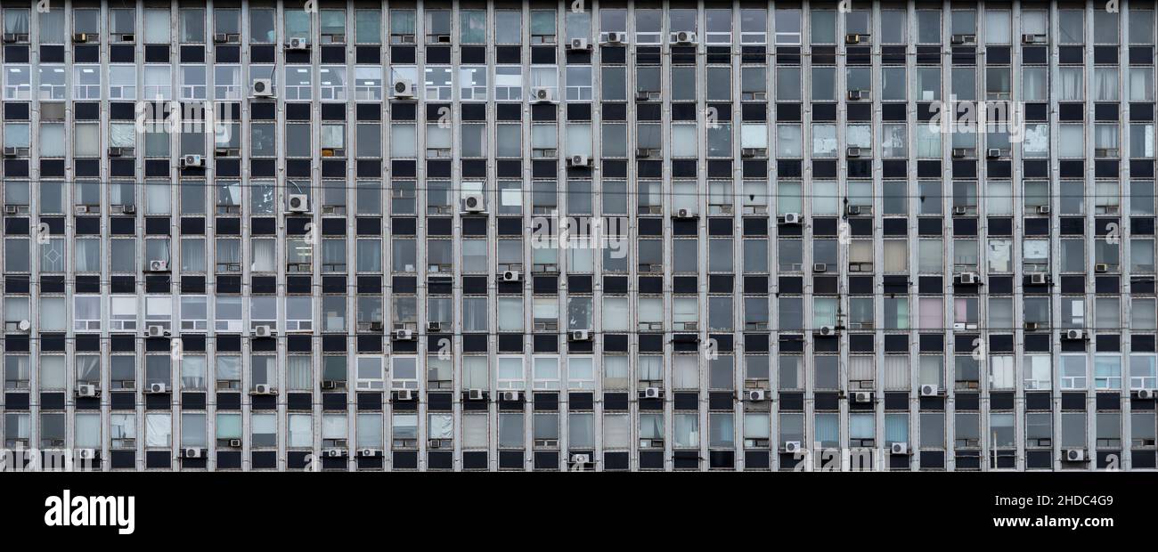 Old Soviet building brutalism style. Lots of windows and floors ...