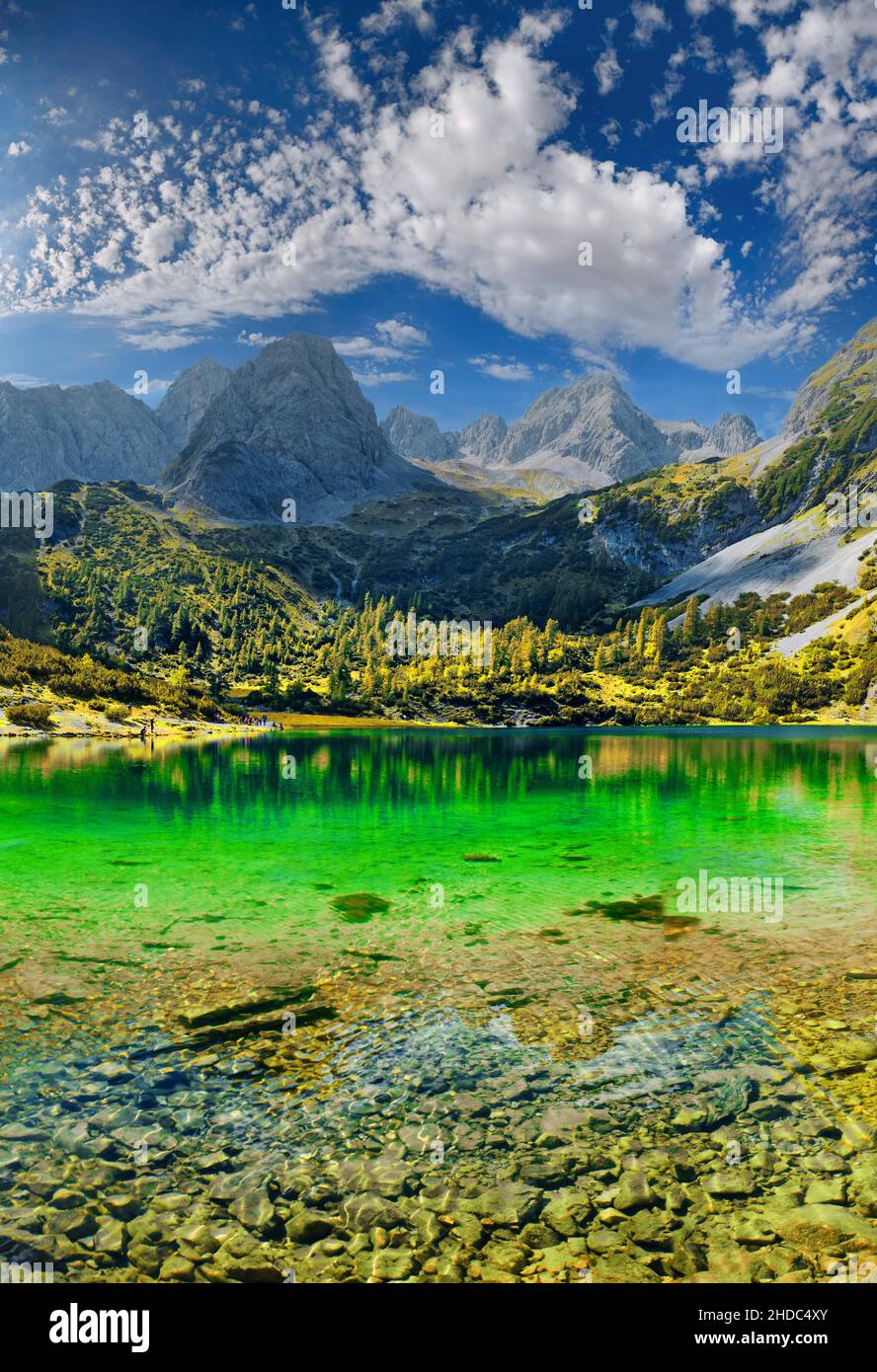 Turquoise Lake Seebensee and the mountain peak of the Tajakopf under a ...