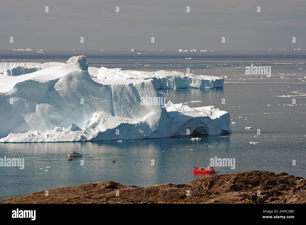 Greenland iceberg red boat hi-res stock photography and images - Alamy