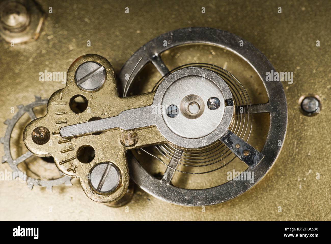 Rate regulation of an old clockwork, studio photography with black ...