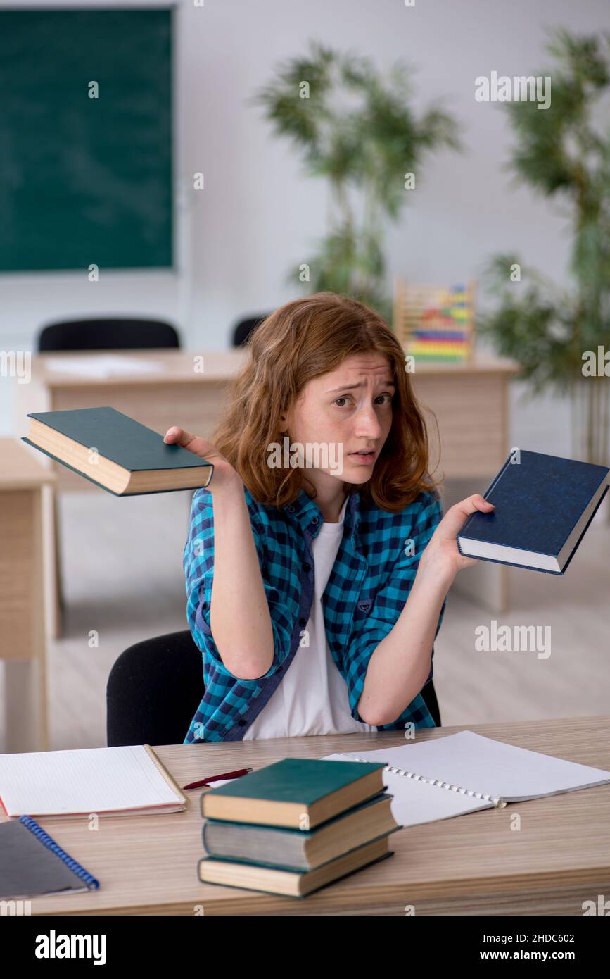 Female student preparing for exams in the classroom Stock Photo - Alamy