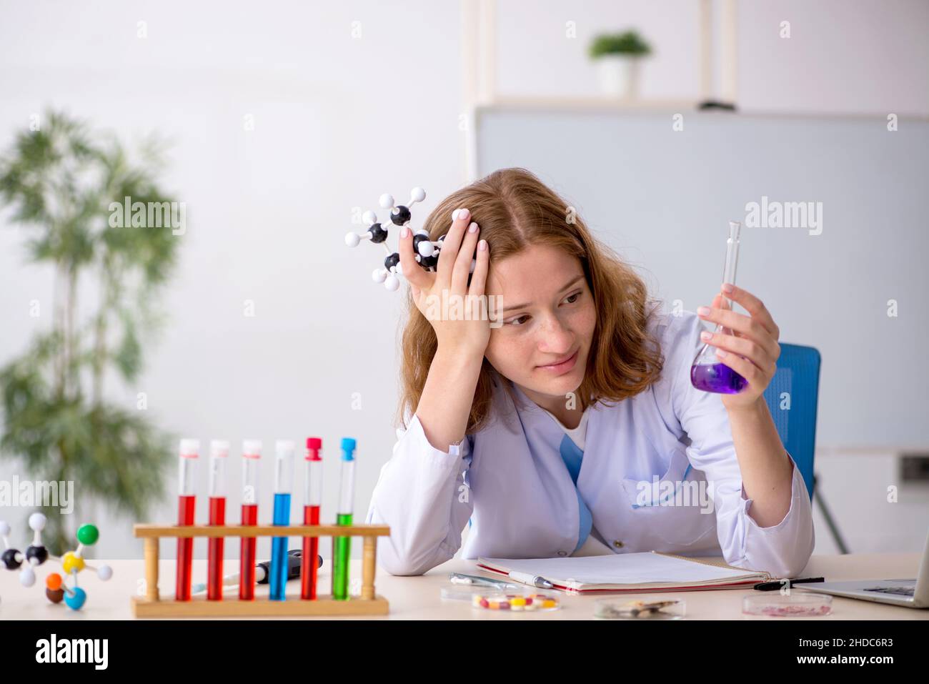 Female scientist studying molecular model hi-res stock photography and ...