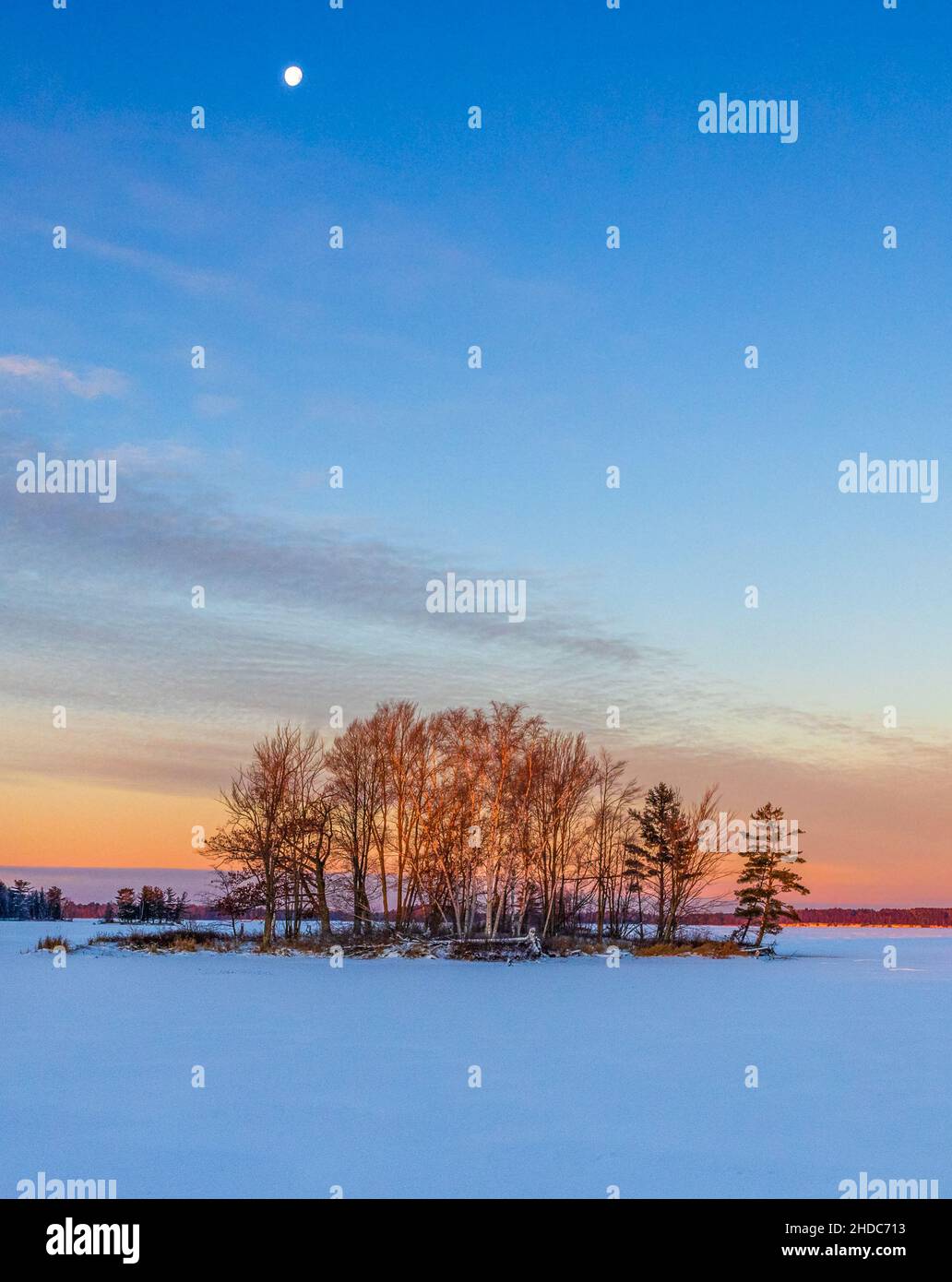 The moon setting on the Chippewa Flowage in northern Wisconsin Stock ...