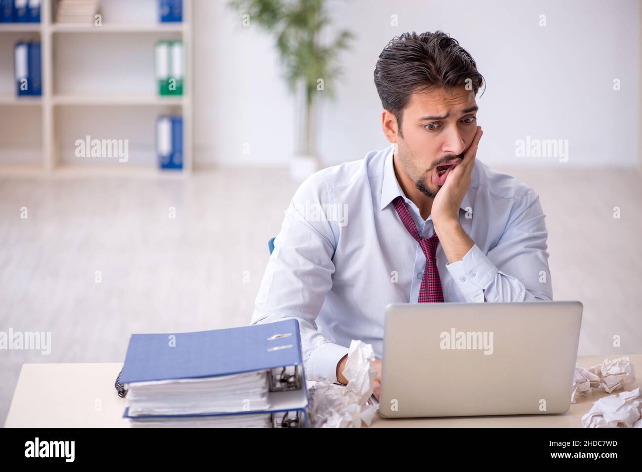 Young businessman employee in rejected ideas concept Stock Photo - Alamy