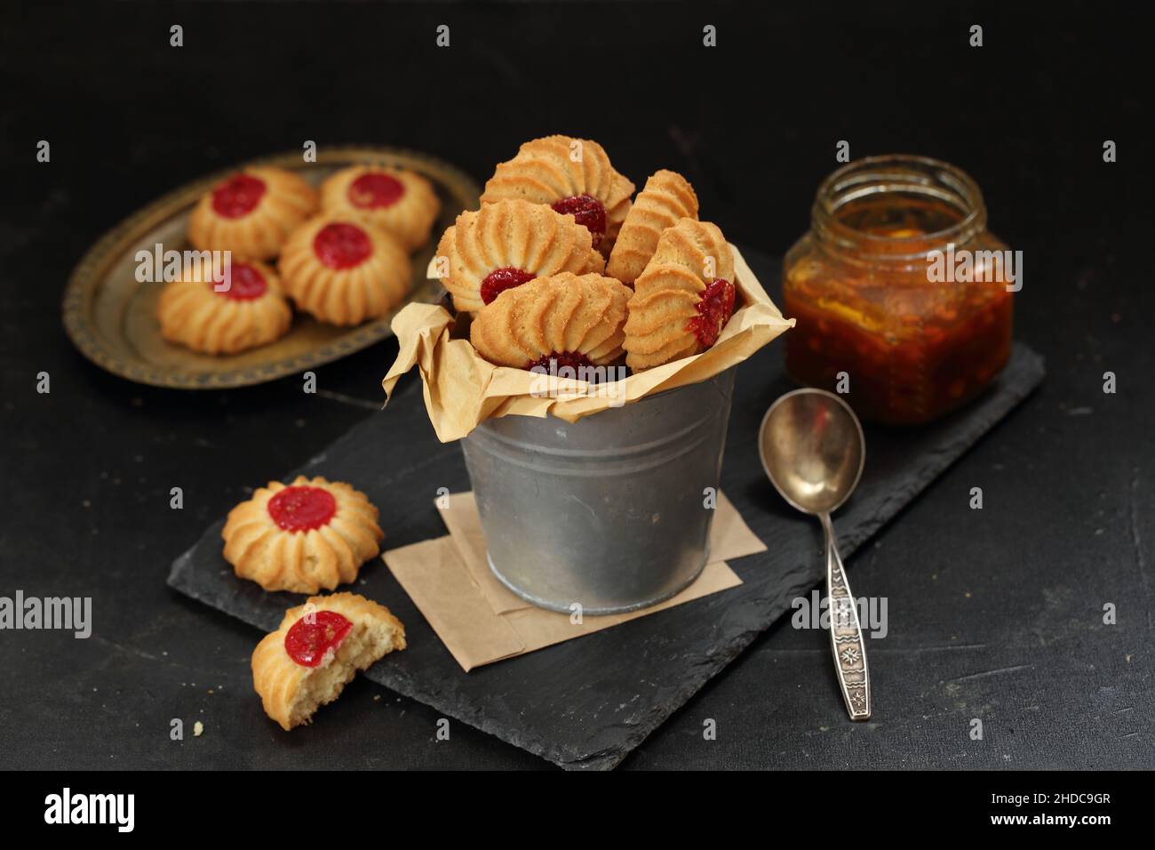 Still life with kurabie cookies on a black background Stock Photo - Alamy
