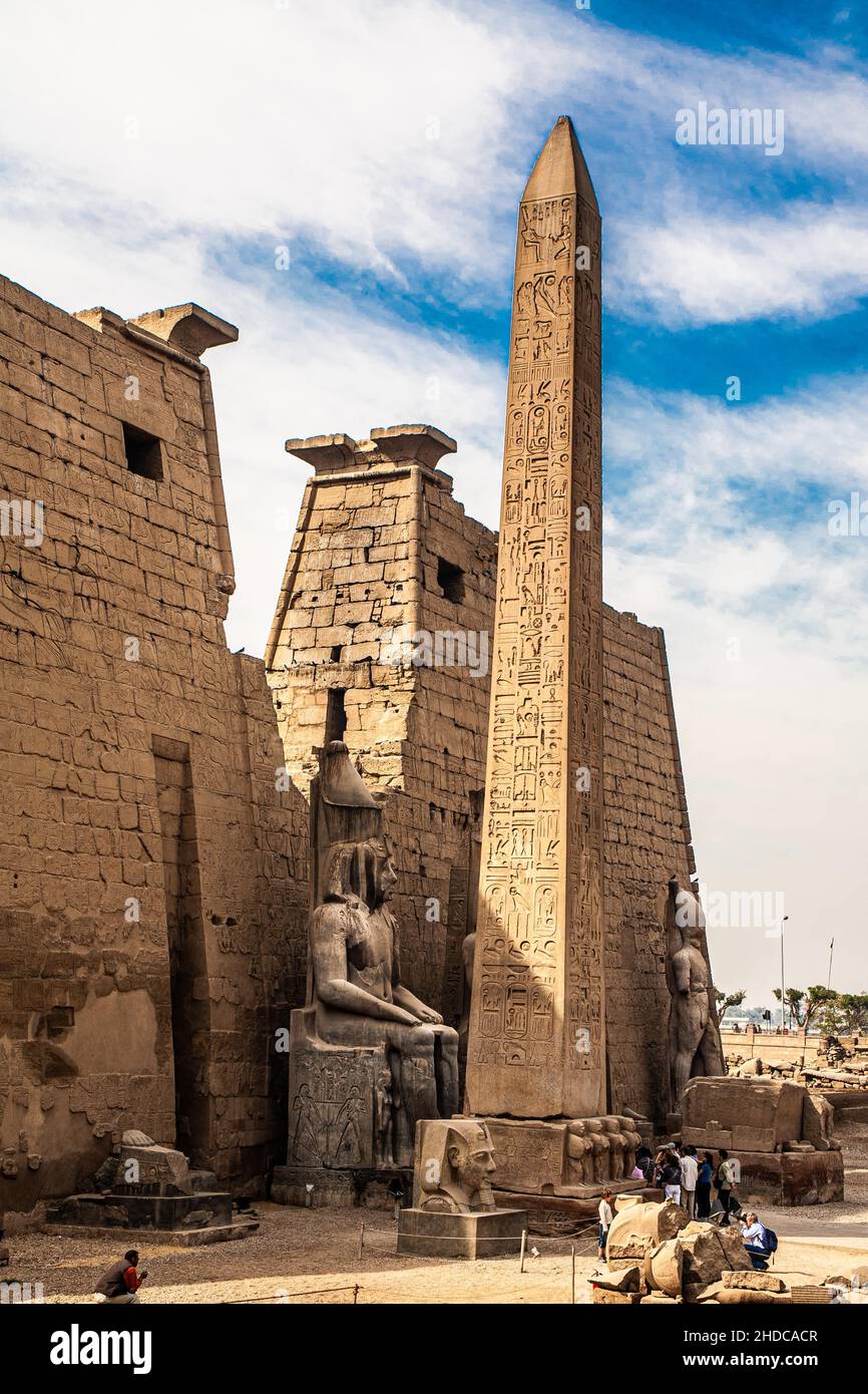 Entrance pylon flanked by two colossal statues of Ramses and obelisk ...
