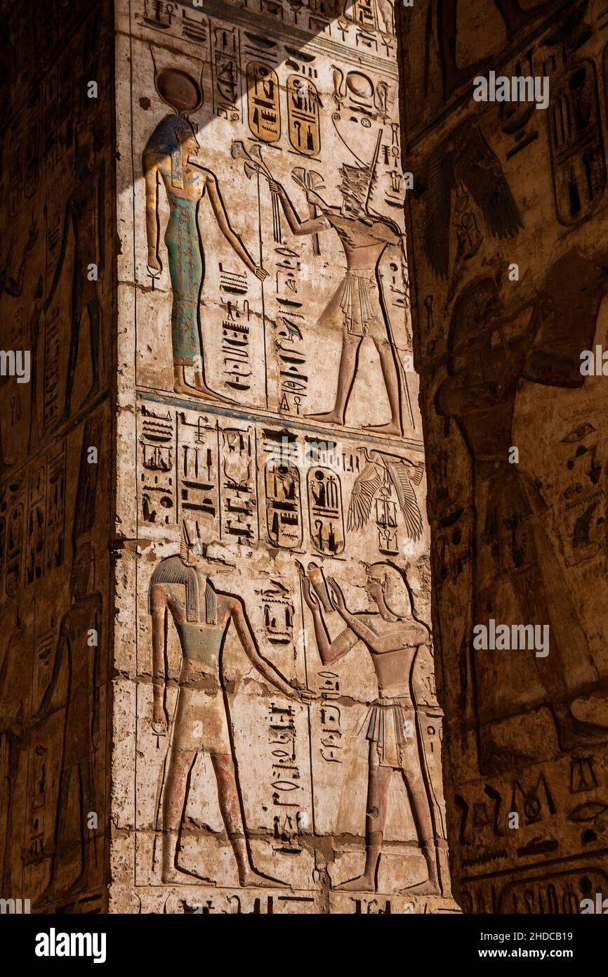 Colourfully well-preserved reliefs on the ceilings, architraves, walls ...