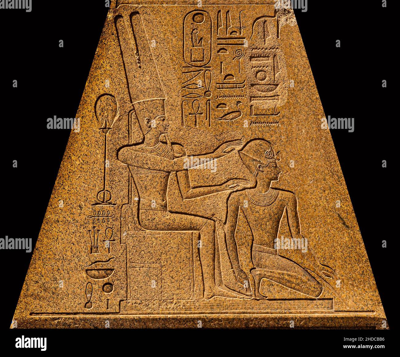 Hatshepsut kneels in front of Amun-Re, a symbol that she is under his ...
