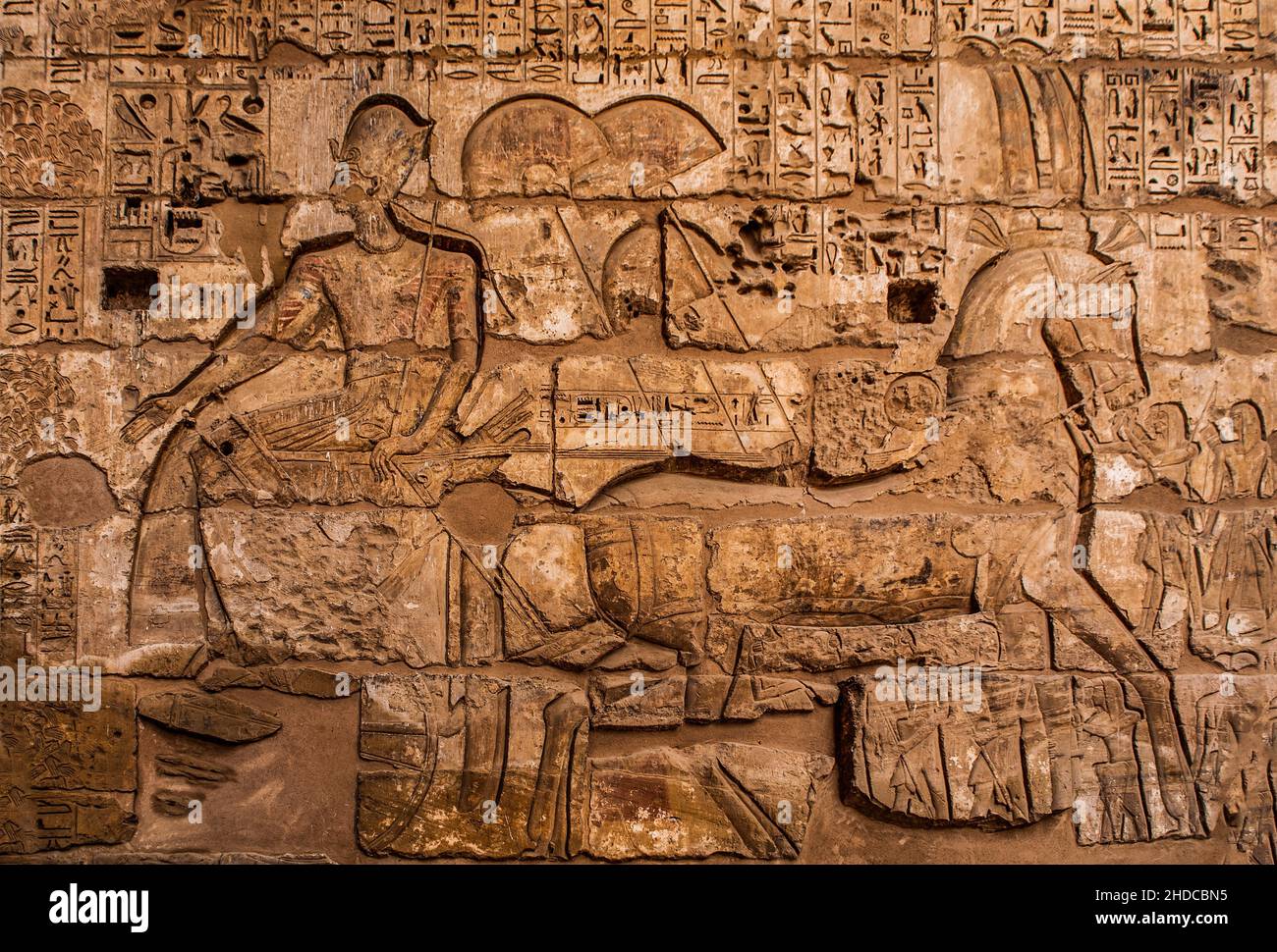 In front of Ramses III in the chariot, cut hands of his defeated ...