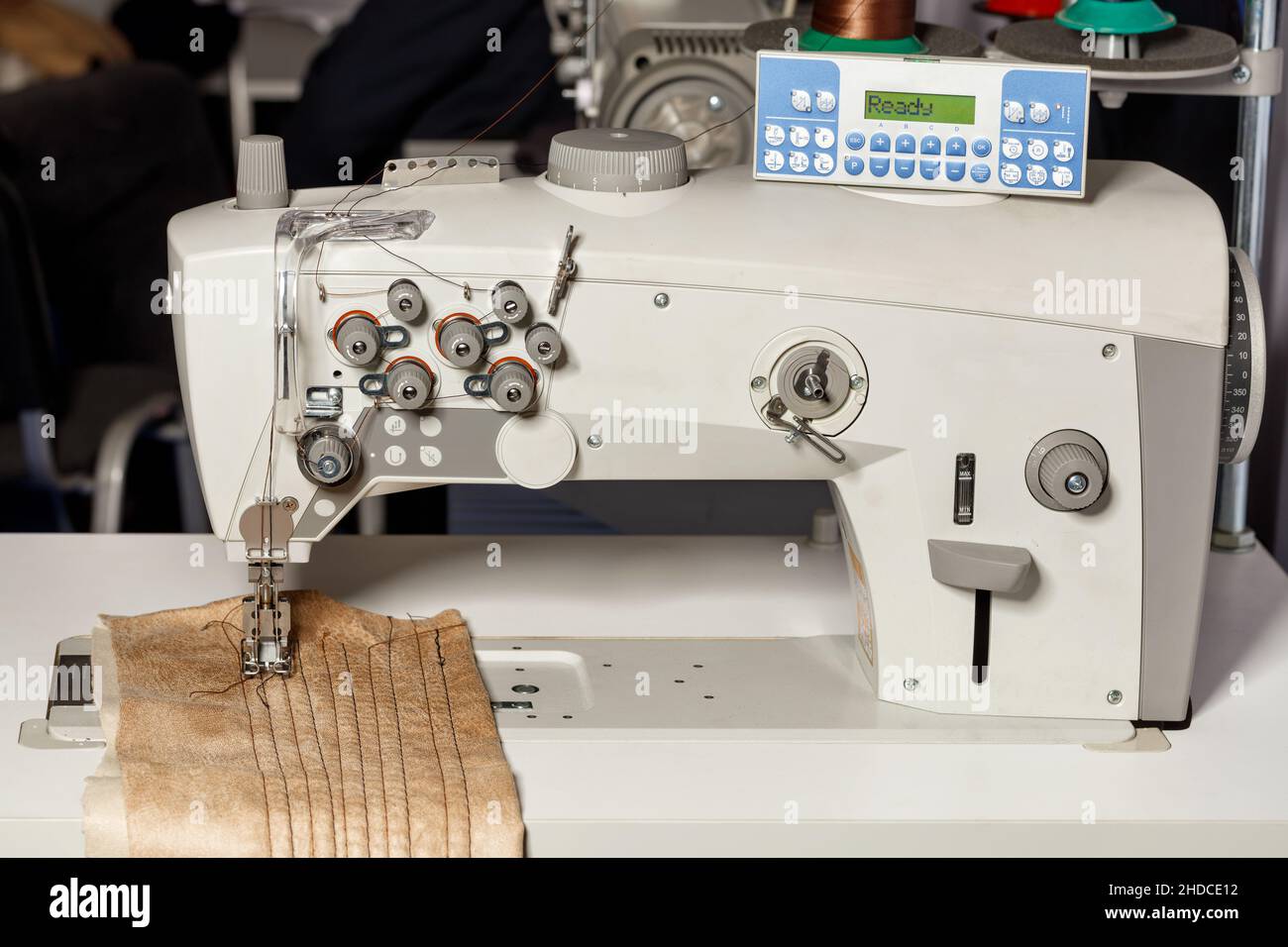 Modern sewing machine for sewing clothes with programmable mechanisms ...