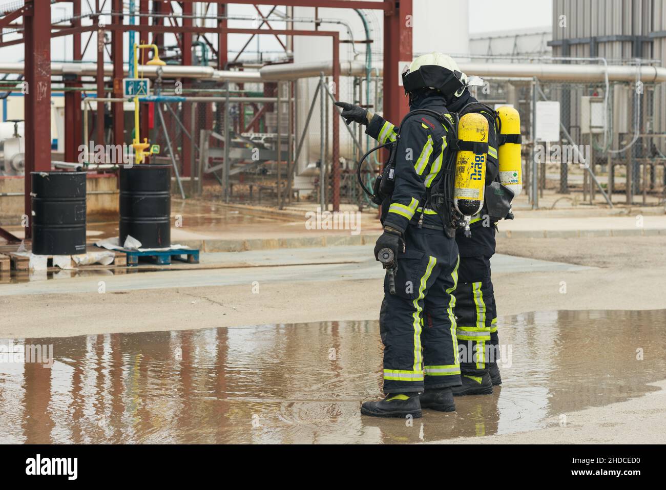Firefighters talking in a training session. Solar thermal plant Stock ...