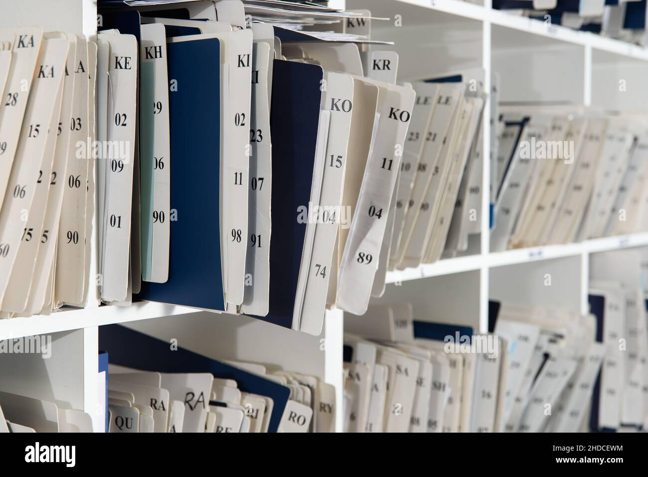Shelves are full with folders and files of medical record, patient ...