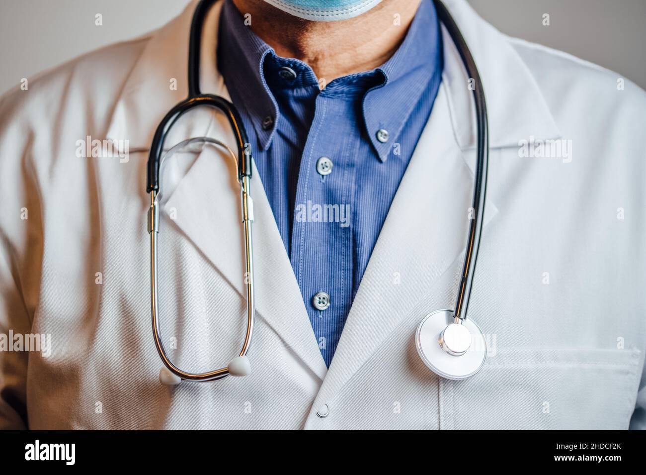 Stethoscope around a doctor's neck Stock Photo - Alamy
