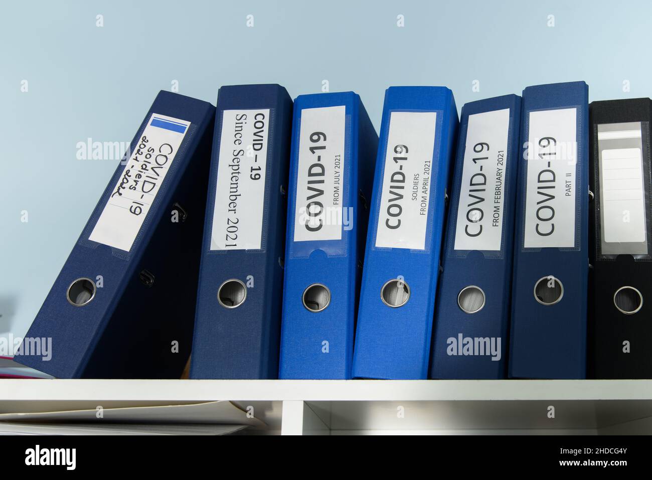 Shelves are full with folders and files of medical record, patient ...
