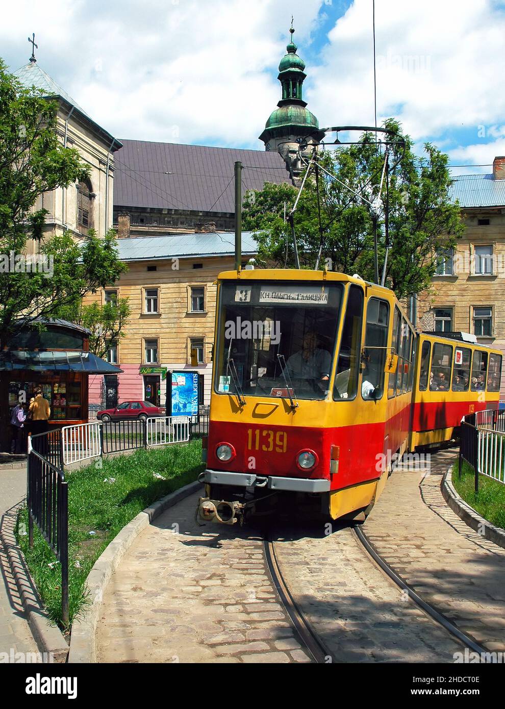 Lviv, Ukraine: Tram in central Lviv. The tram is bright yellow and red ...