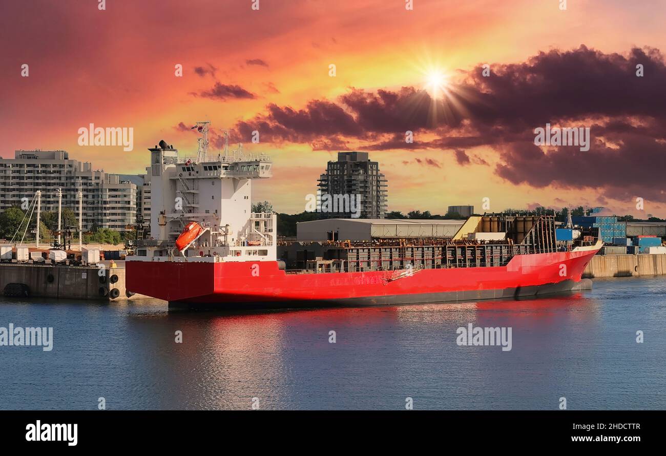 International container cargo ship leaving port harbor and terminal ...
