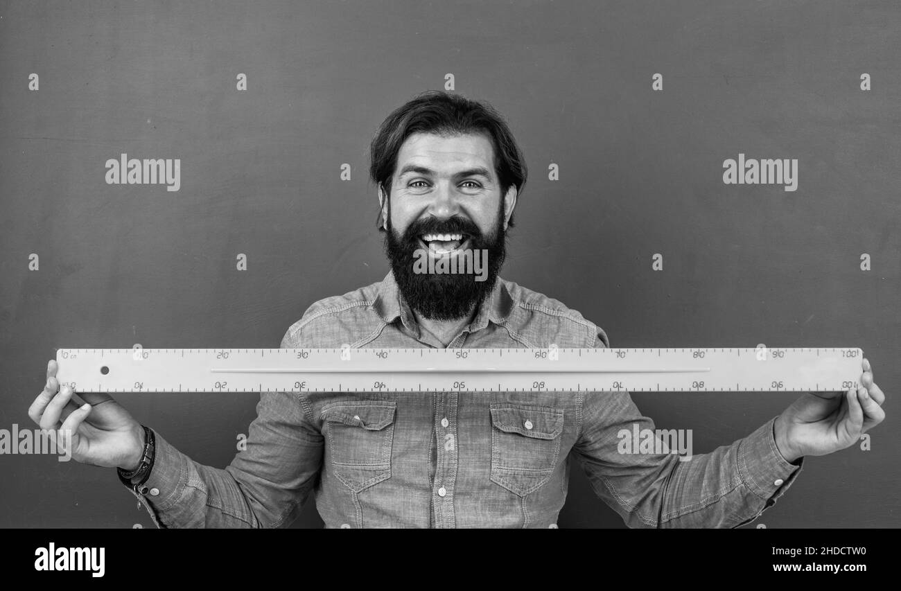 man happy with size measured on ruler math tool, measuring length Stock ...