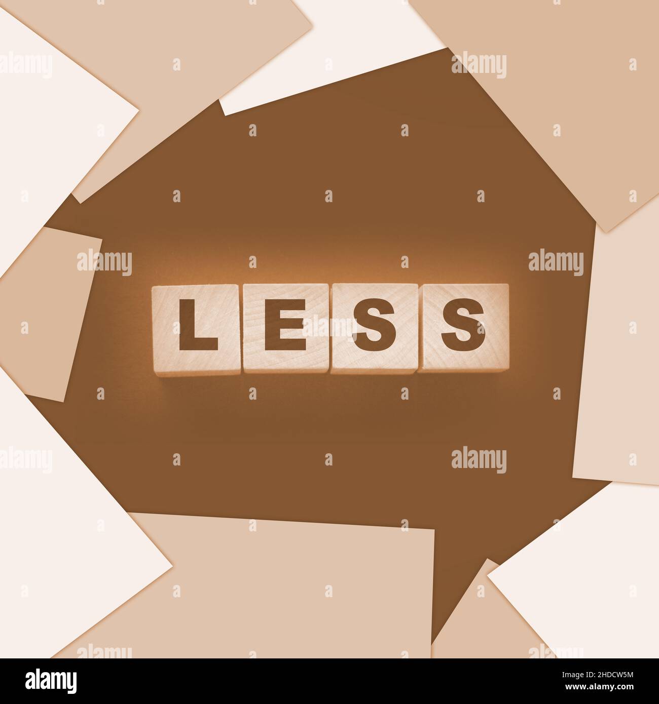 Less word on wooden cubic blocks. Spend less or cut costs business ...